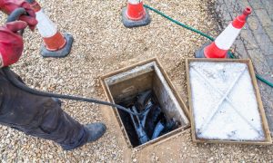 Basement Floor Drain Backing Up? Here's How to Fix It